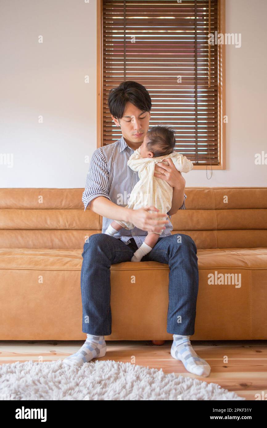Father Taking Care of Child Stock Photo - Alamy