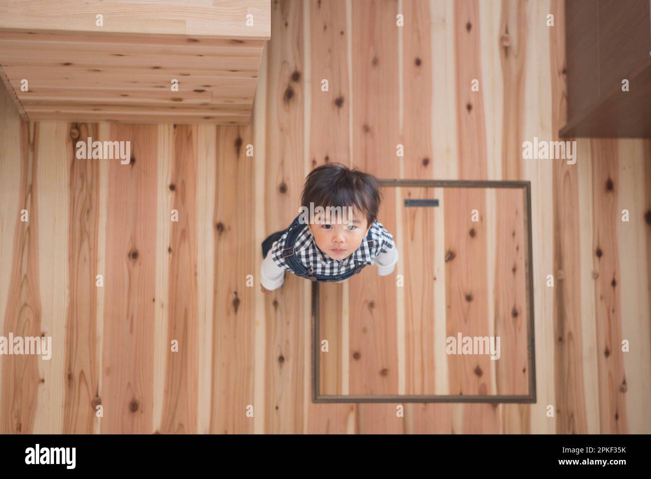Boy looking up Stock Photo - Alamy