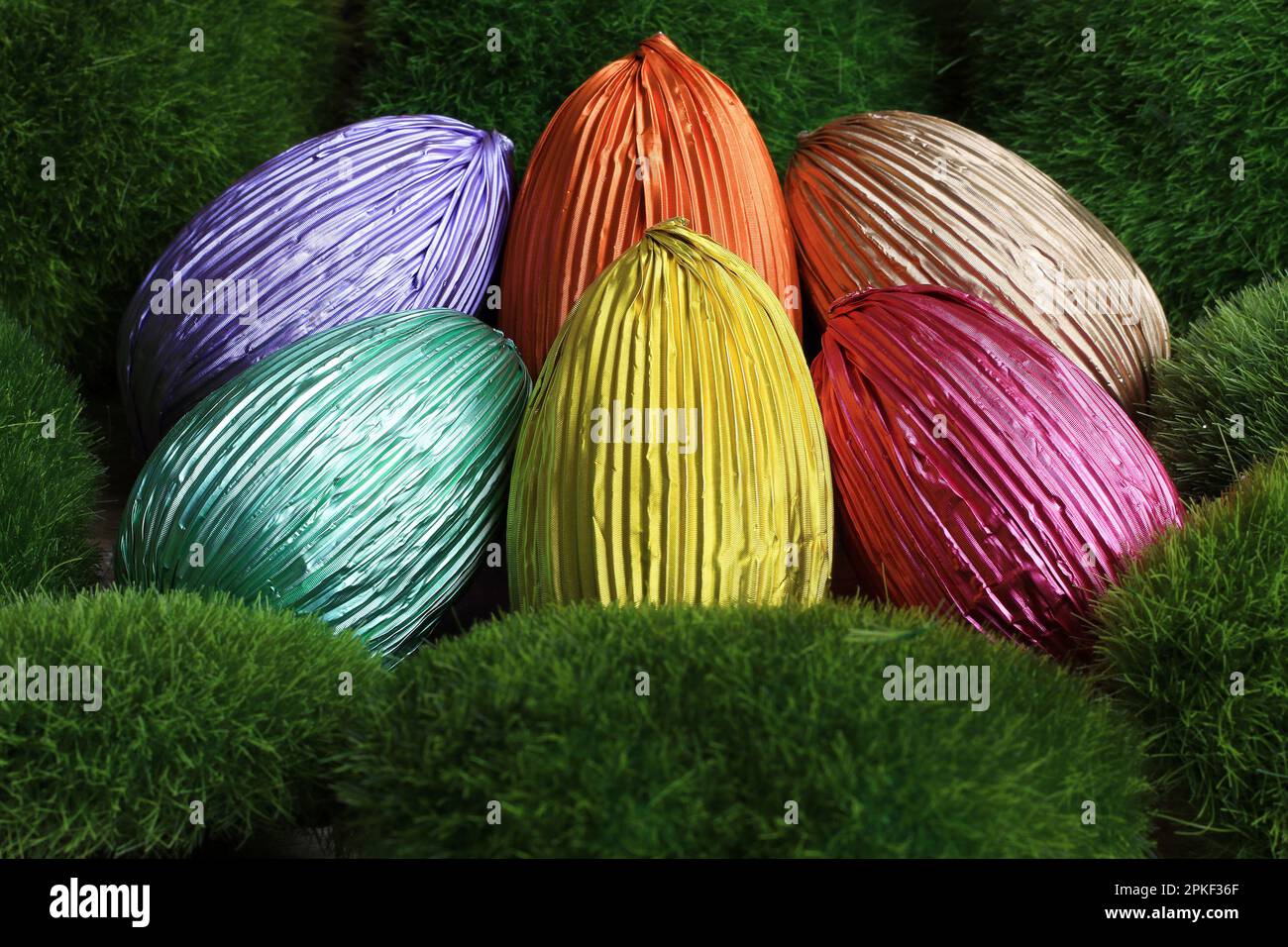 Colorful Easter chocolate eggs in grass Stock Photo - Alamy