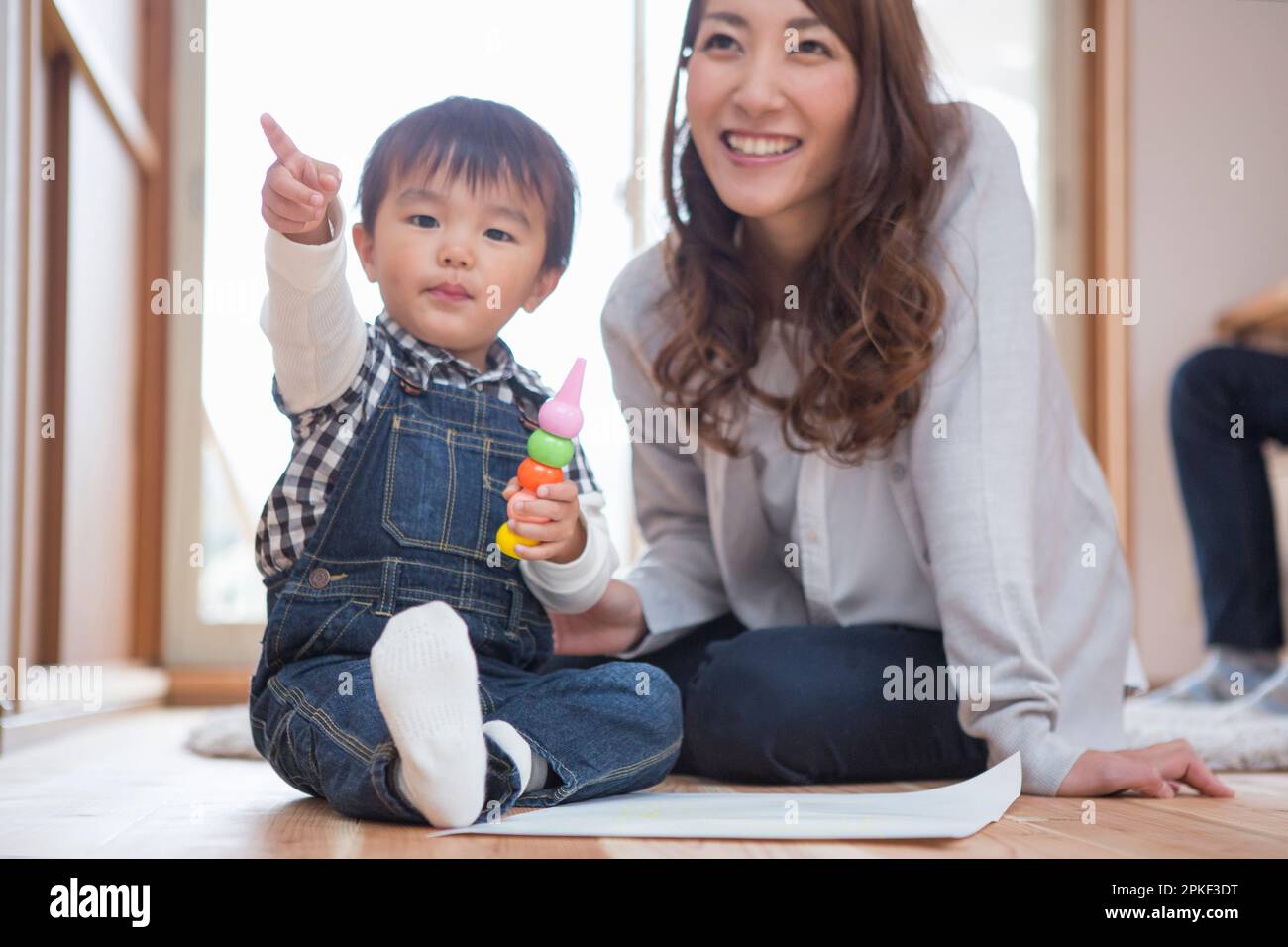 Boy playing with toys Stock Photo - Alamy