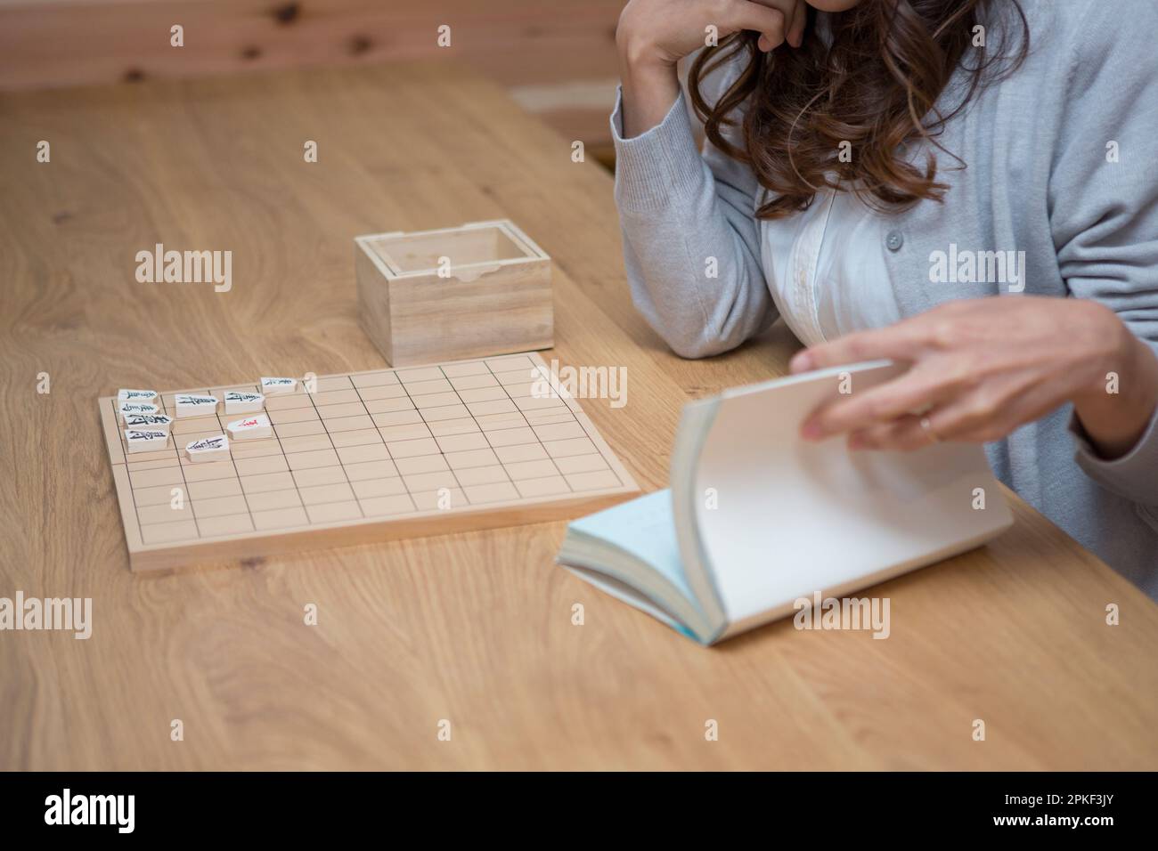 Woman playing Shogi Stock Photo - Alamy