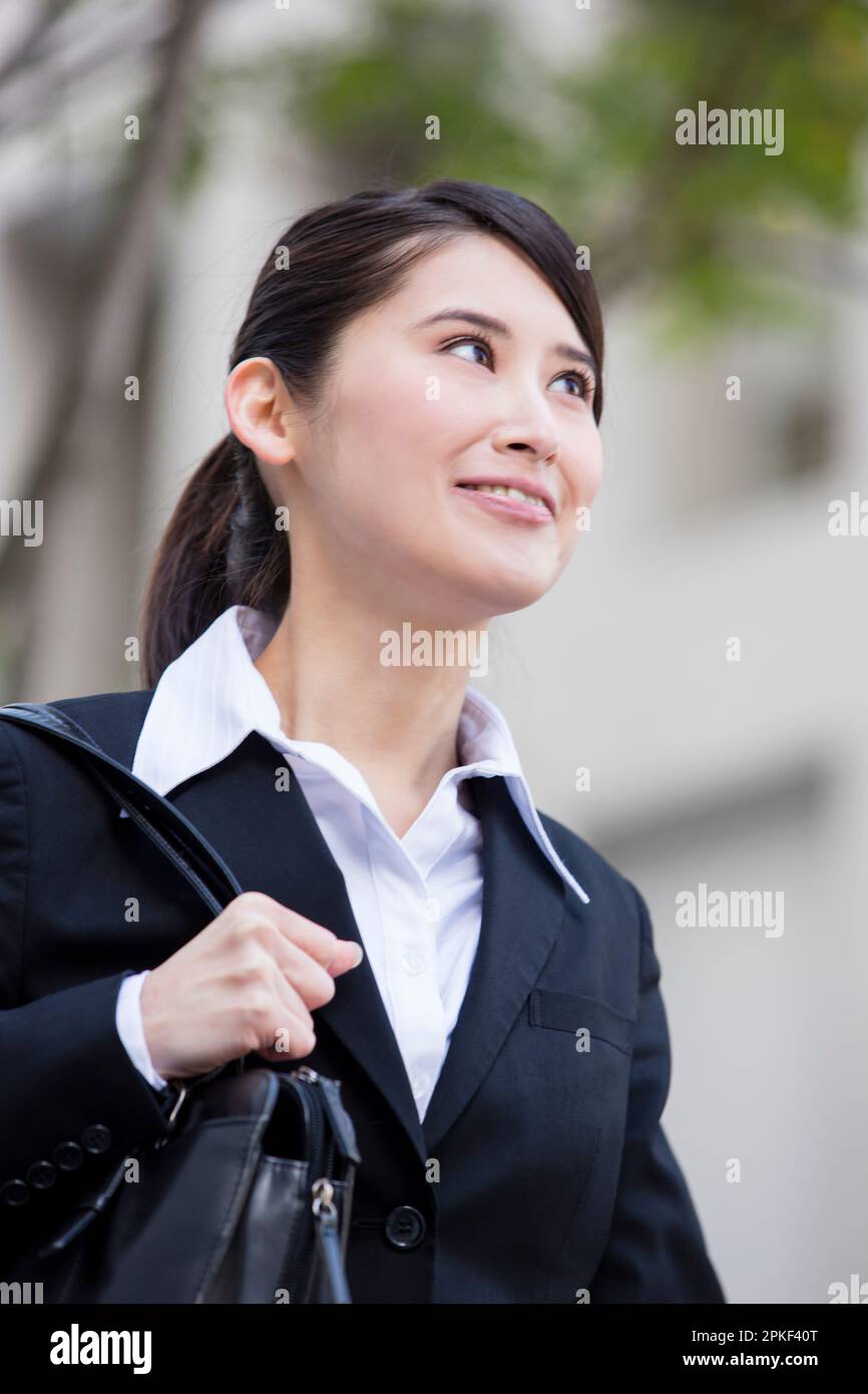 Asian woman walking stylish hi-res stock photography and images - Alamy