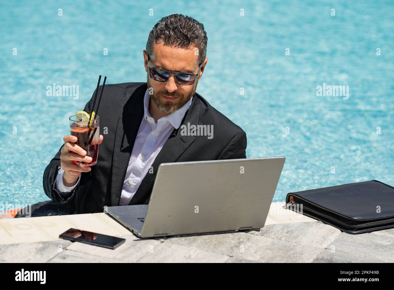 Successful business man in suit in pool water. Business man in suit ...
