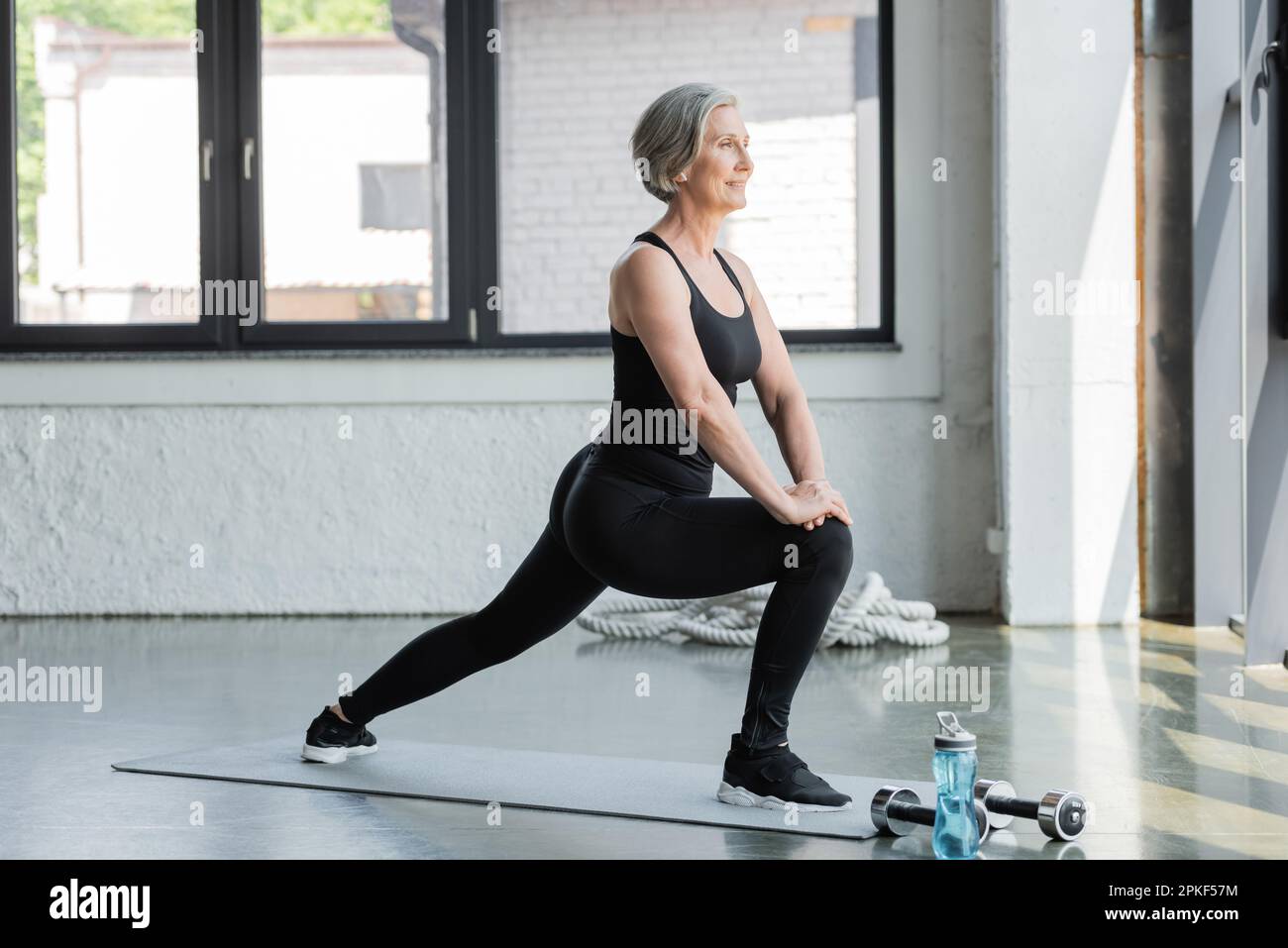 Senior woman doing fitness sport hi-res stock photography and images ...