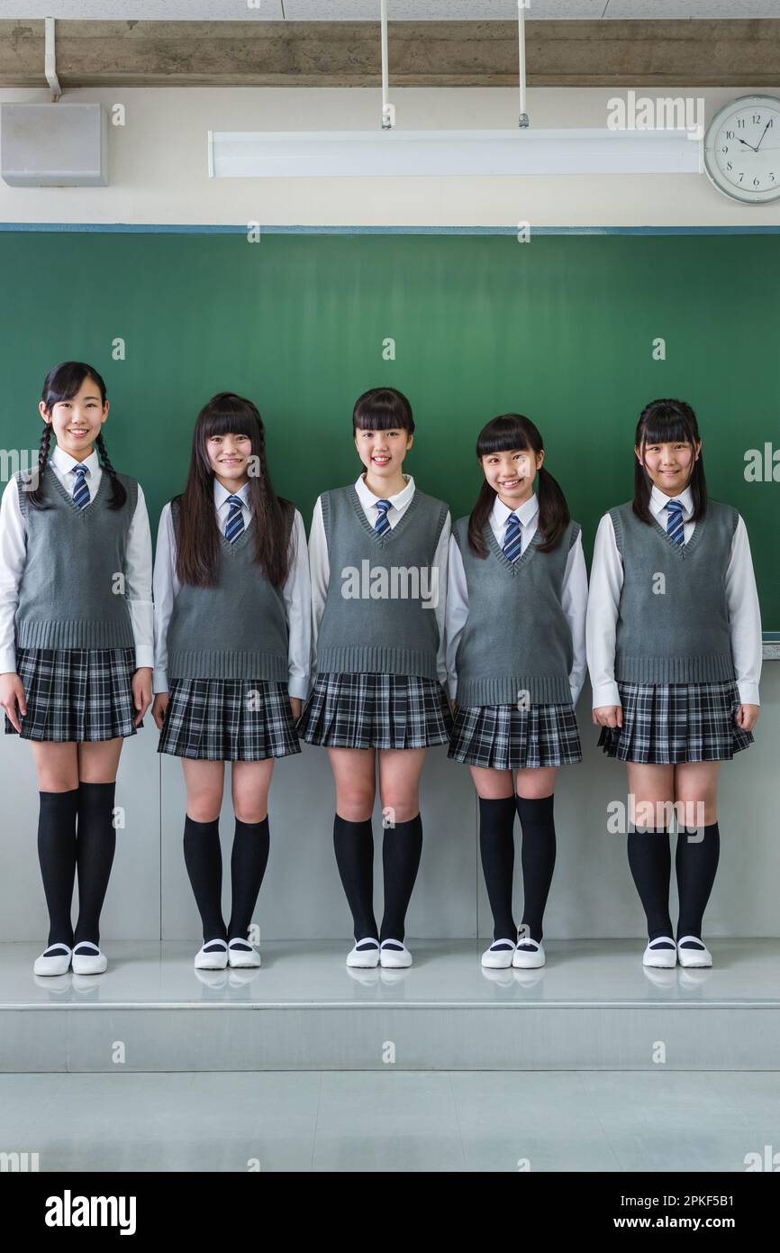 Junior high school girls who get along well with each other Stock Photo ...