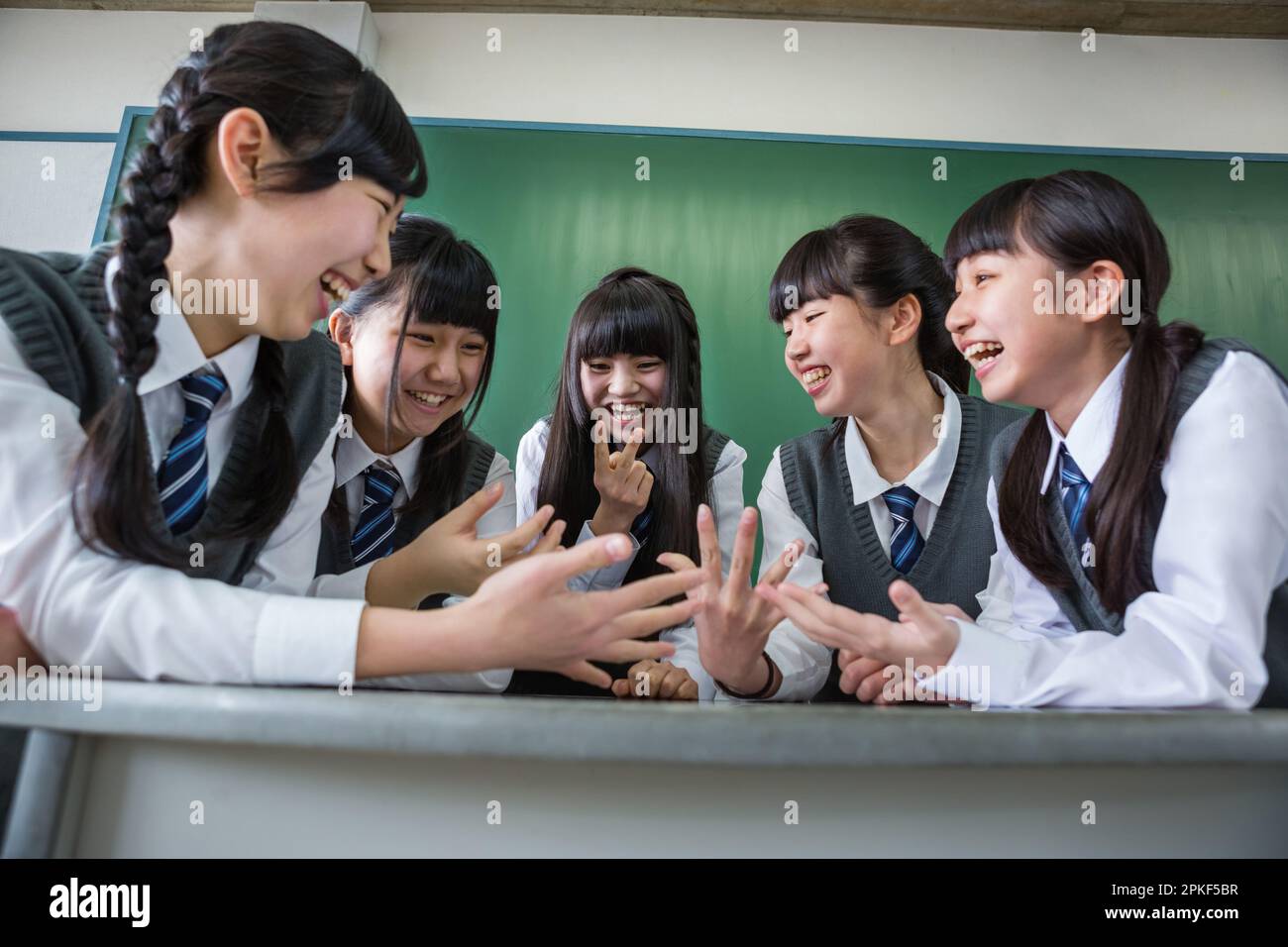 Junior high school girls who get along well with each other Stock Photo ...