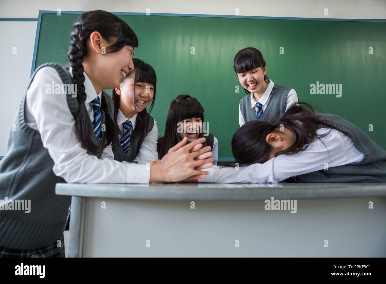 Junior high school girls who get along well with each other Stock Photo ...