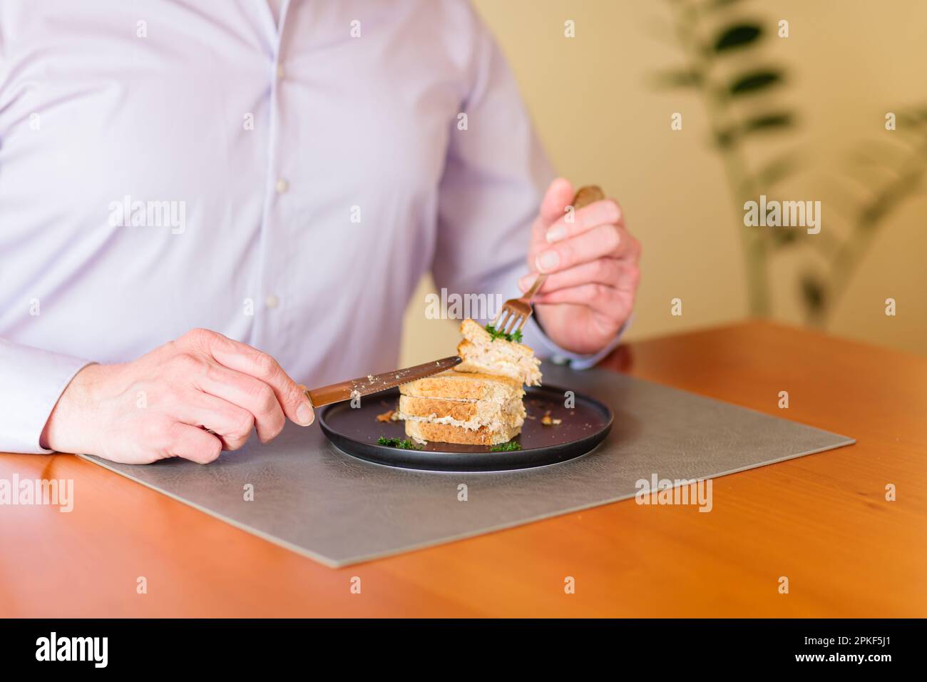 Close-up of man eating a sandwich Stock Photo - Alamy