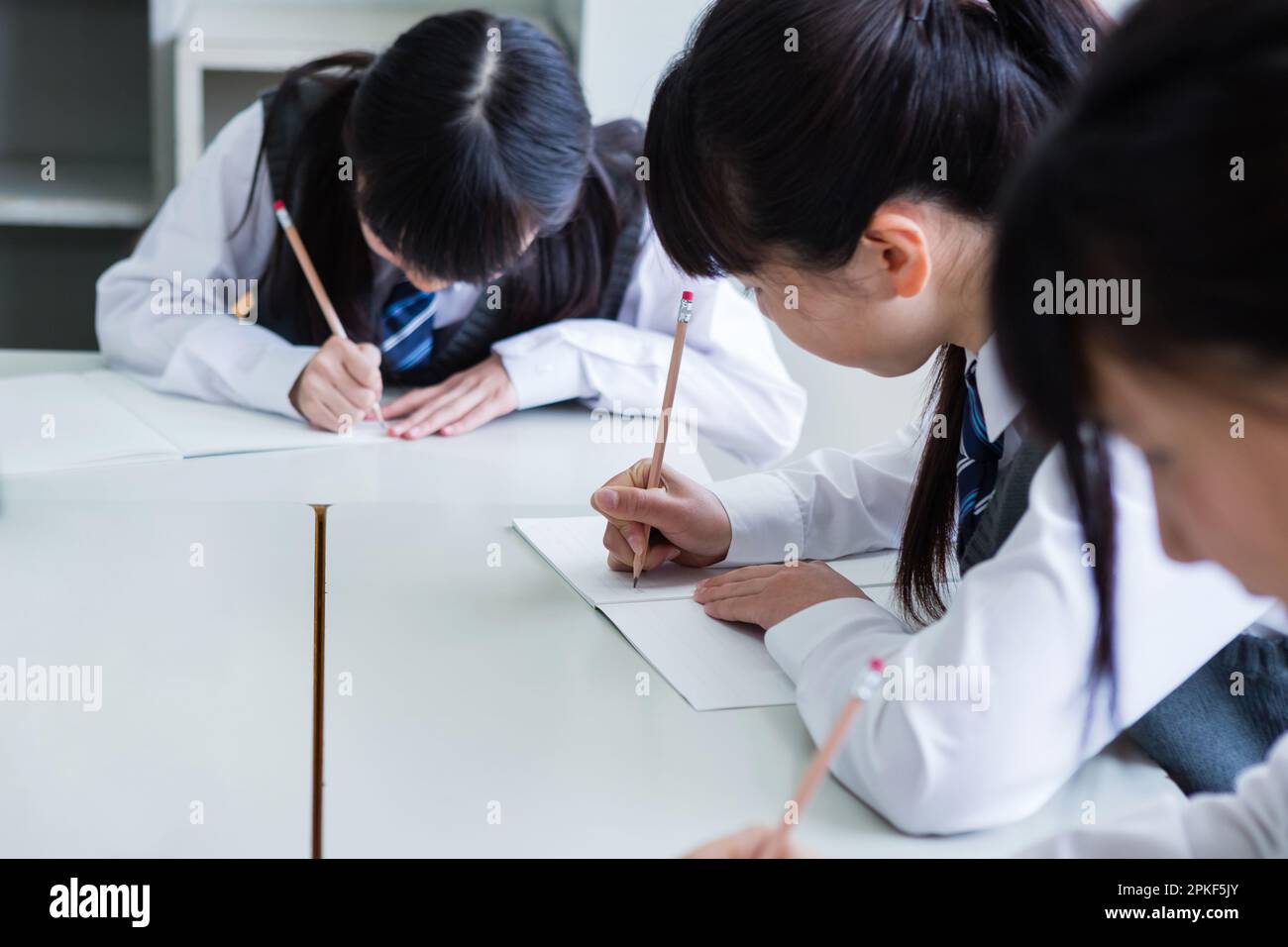 Group work school uniform hi-res stock photography and images - Alamy