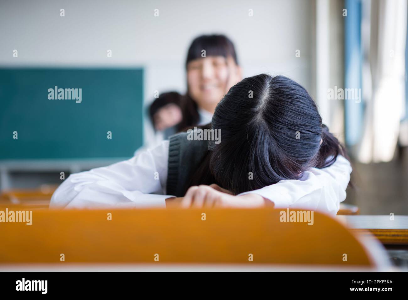Junior high school girls dozing off Stock Photo - Alamy