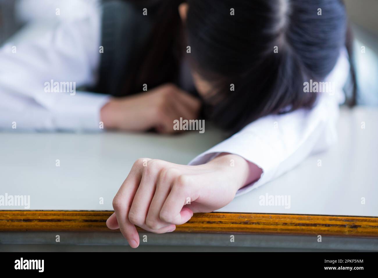 Junior high school girls dozing off Stock Photo - Alamy