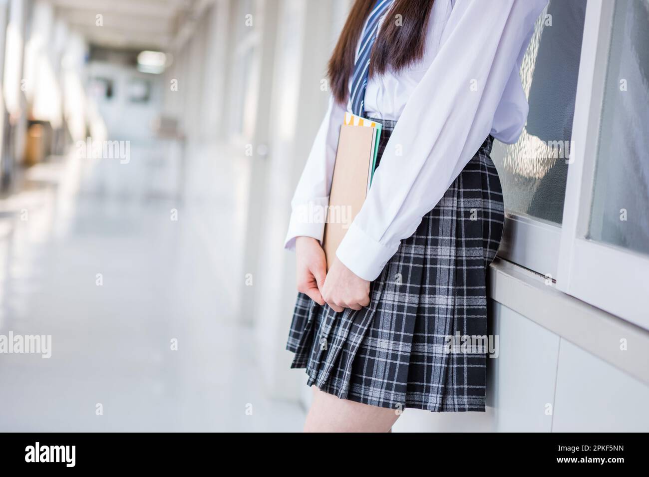 Girl Walking In High School Hallway