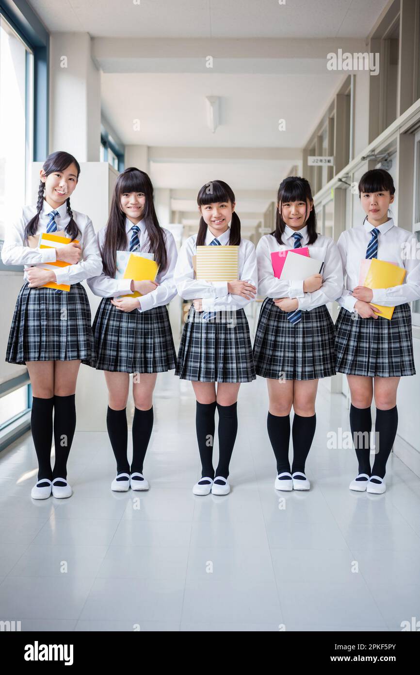 Junior high school girls getting along well with each other Stock Photo ...