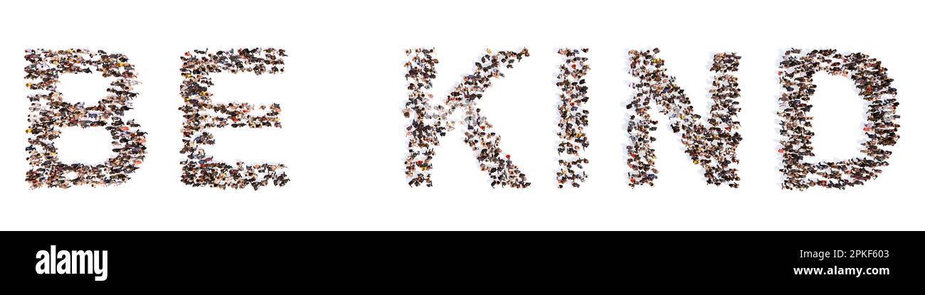 Concept or conceptual large community of people forming BE KIND slogan ...