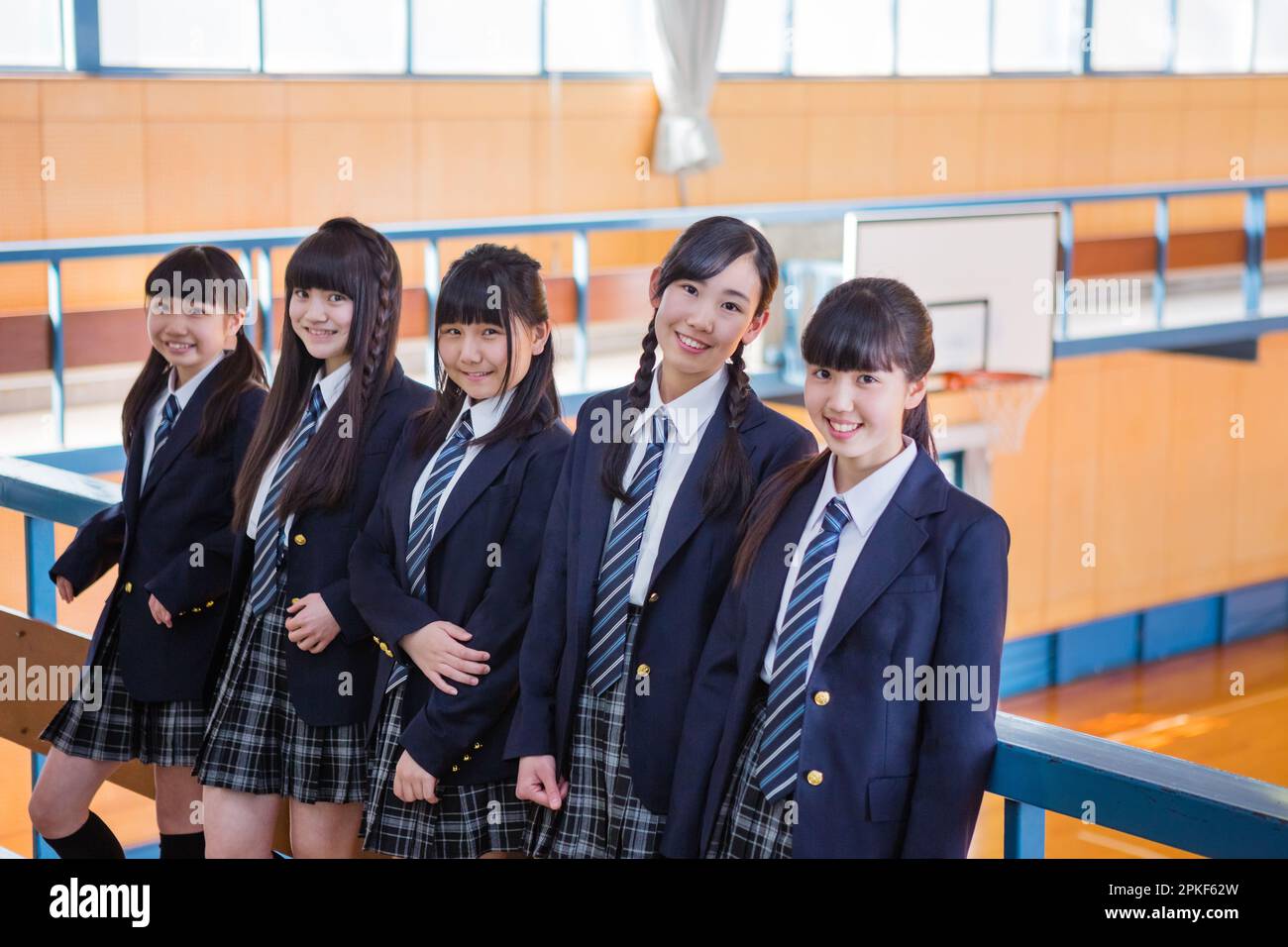 Junior High School Girls Leaning on the Handrail on the Second Floor of ...
