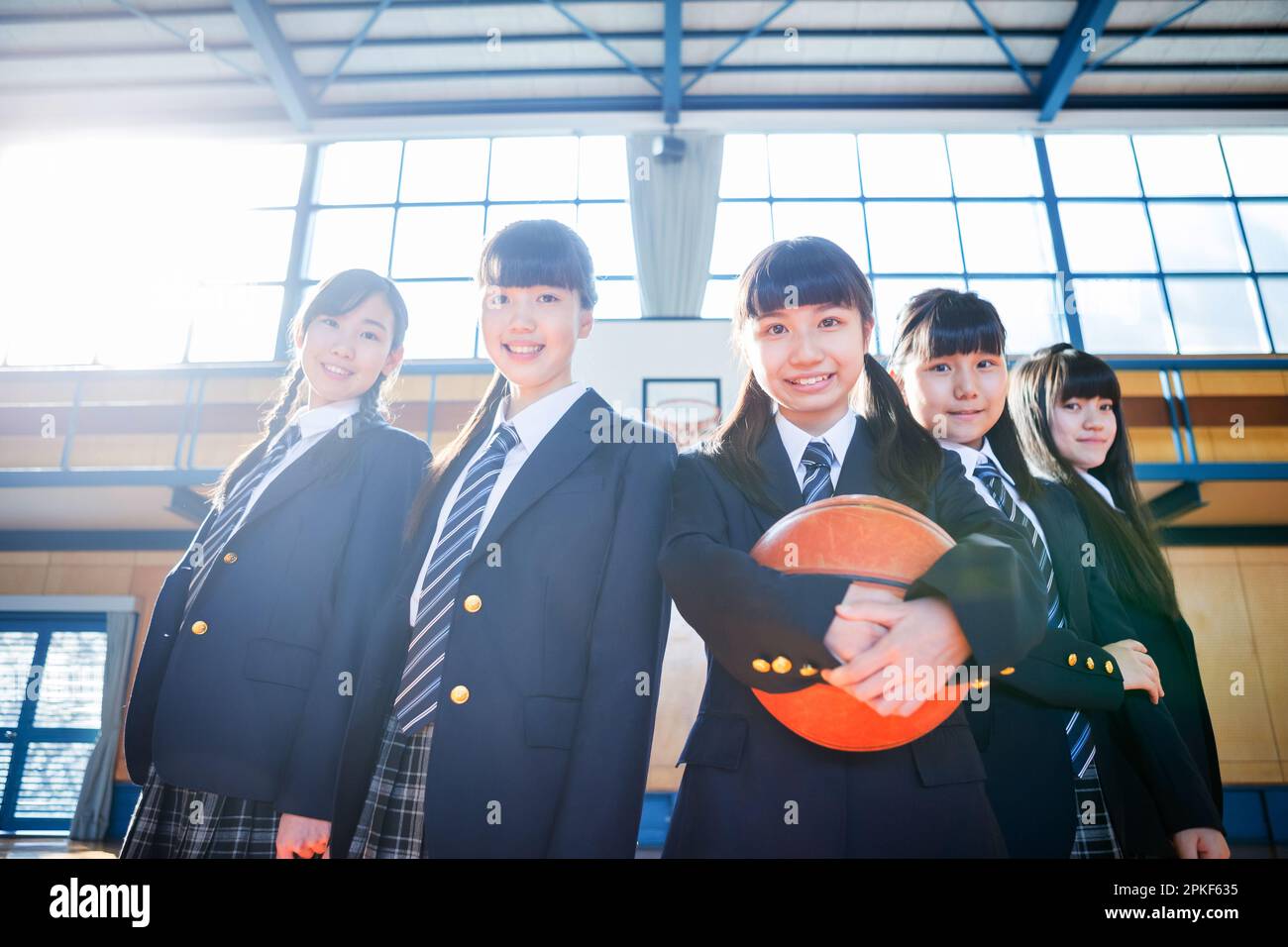 Junior High School Girls Standing Side by Side in Gymnasium Stock Photo ...