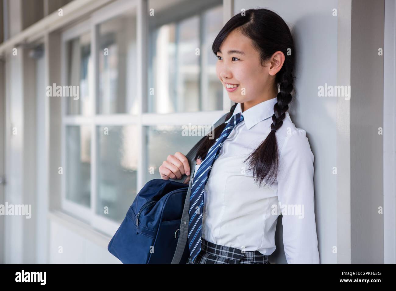 Girl Walking In High School Hallway