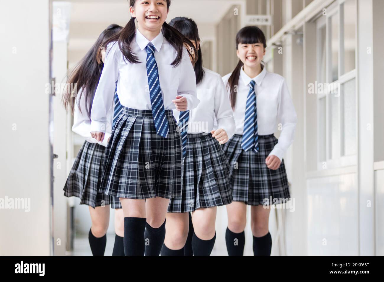 Junior high school girls who get along well with each other Stock Photo ...