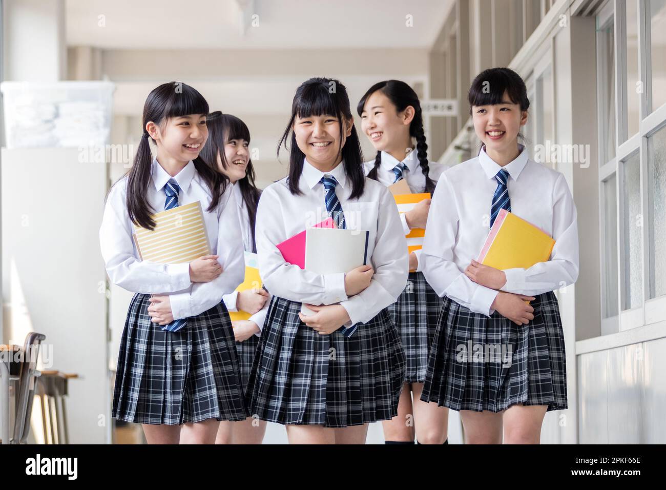 Junior high school girls getting along well with each other Stock Photo ...