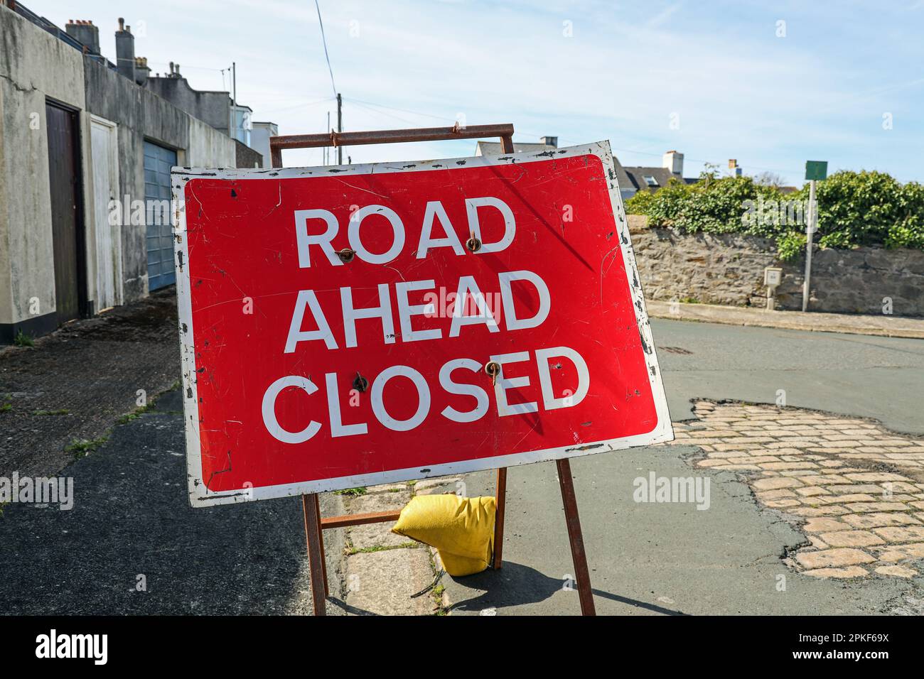 Road Ahead Closed sign from a utility company making essential upgrades ...