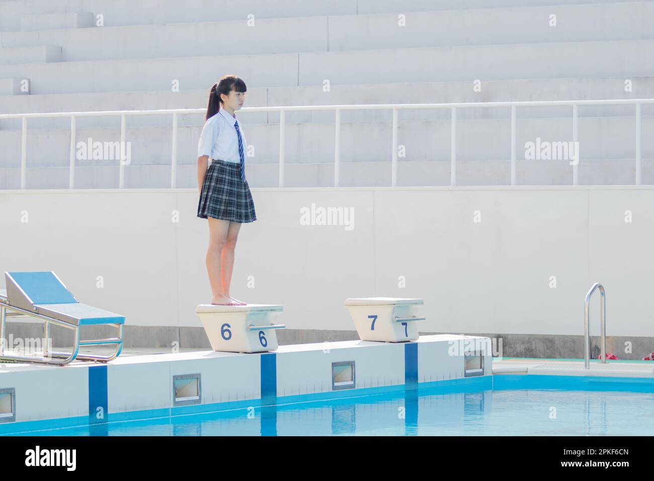 Junior High School Girl Standing on the Diving Board Stock Photo - Alamy