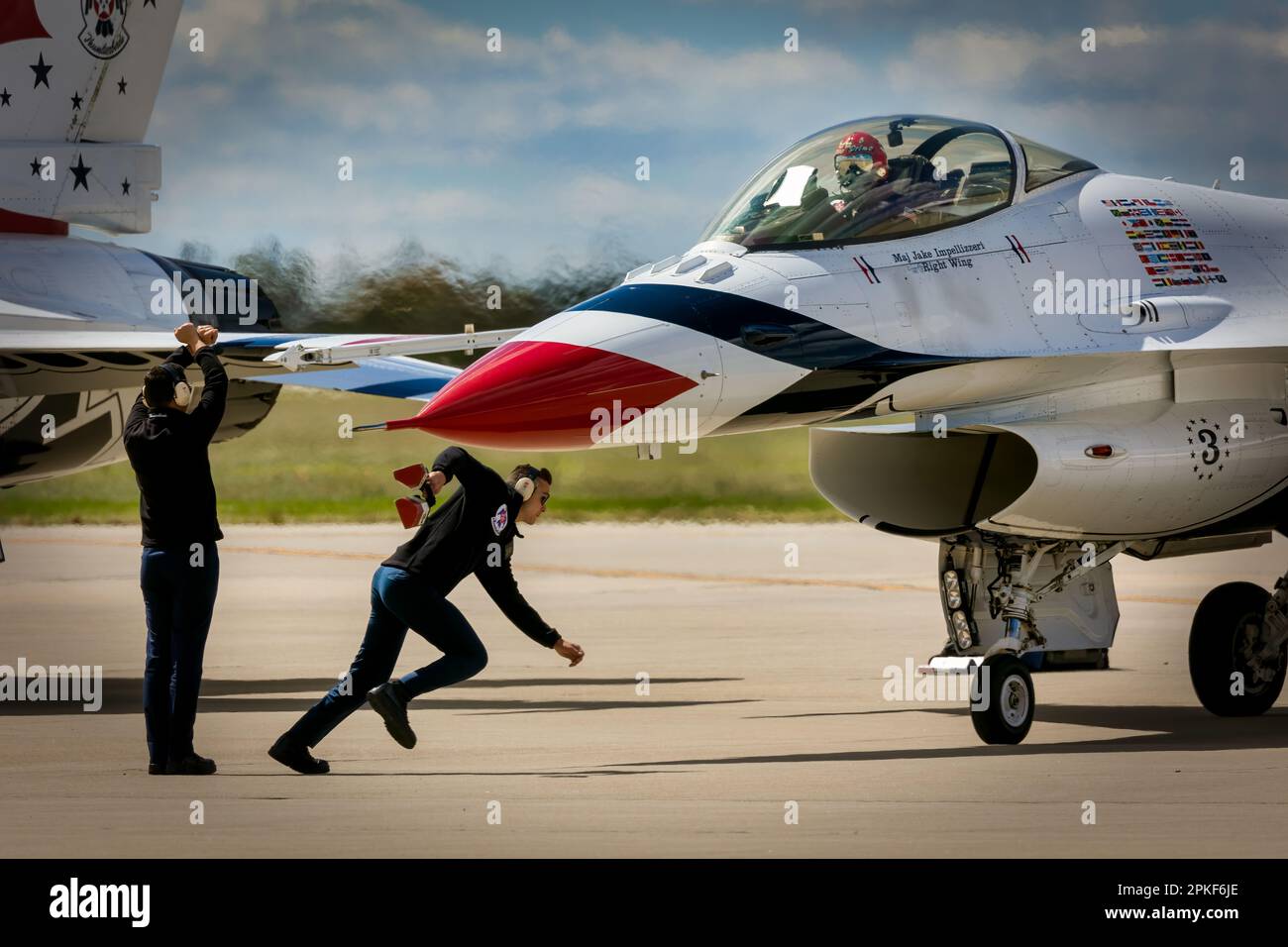 The US Air Force Thunder Birds return to their air crew after a ...
