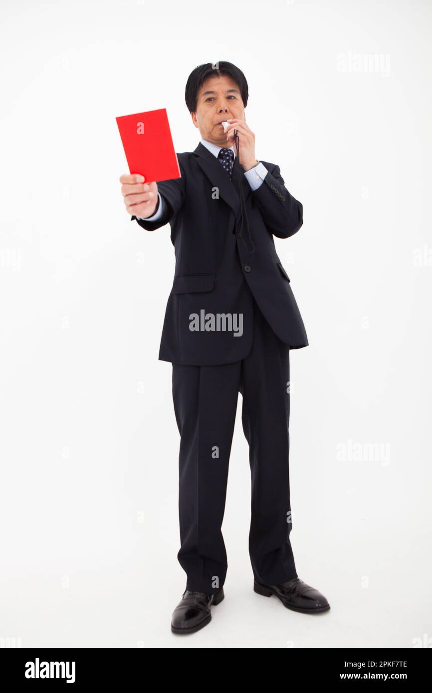 Man giving red card Stock Photo - Alamy