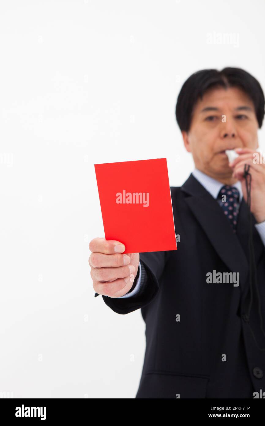 Man giving red card Stock Photo - Alamy