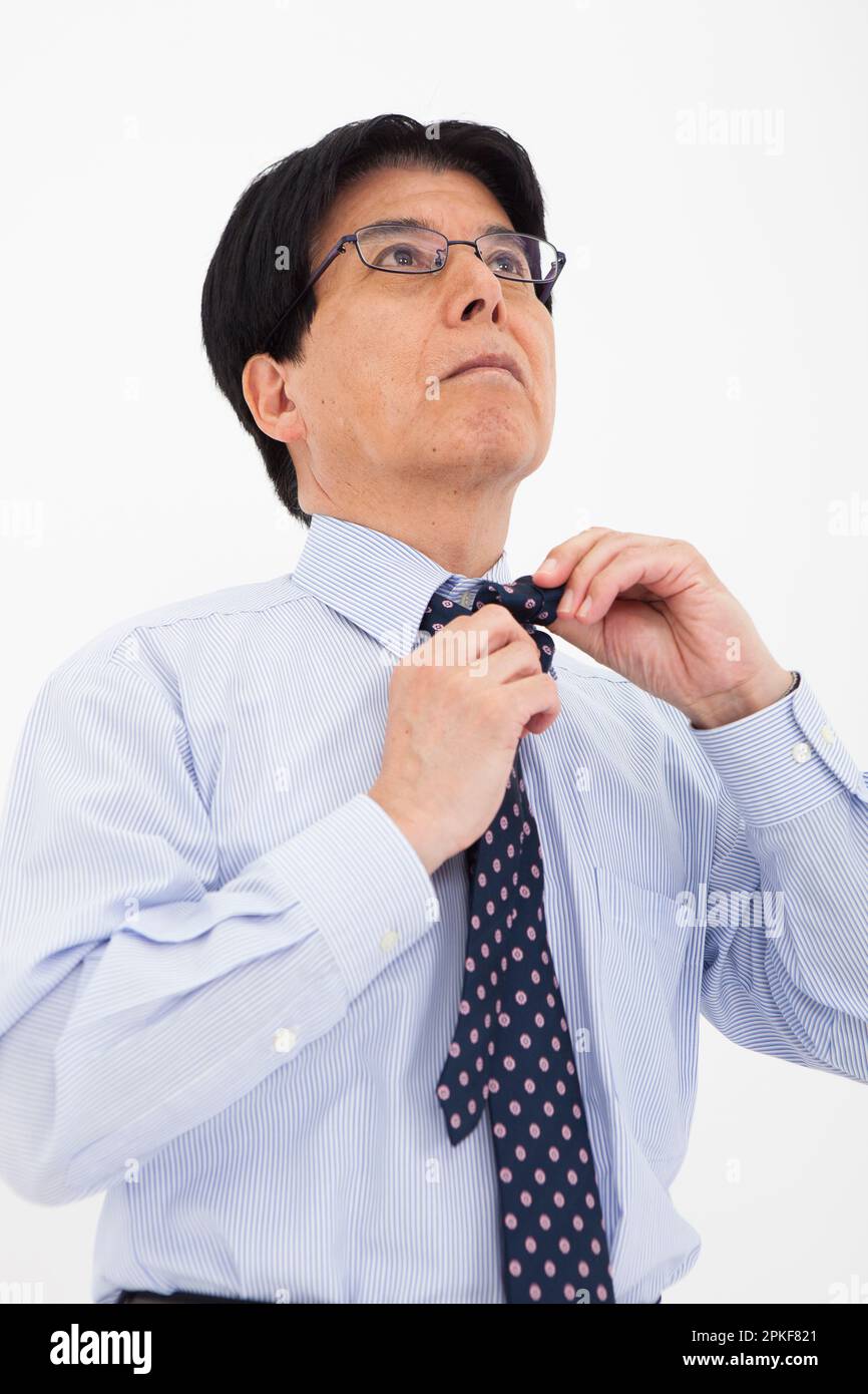 Senior asian man dressing hi-res stock photography and images - Alamy
