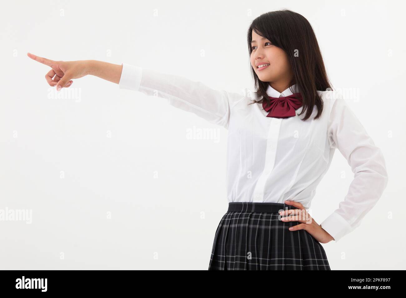 High school student pointing into the distance Stock Photo - Alamy