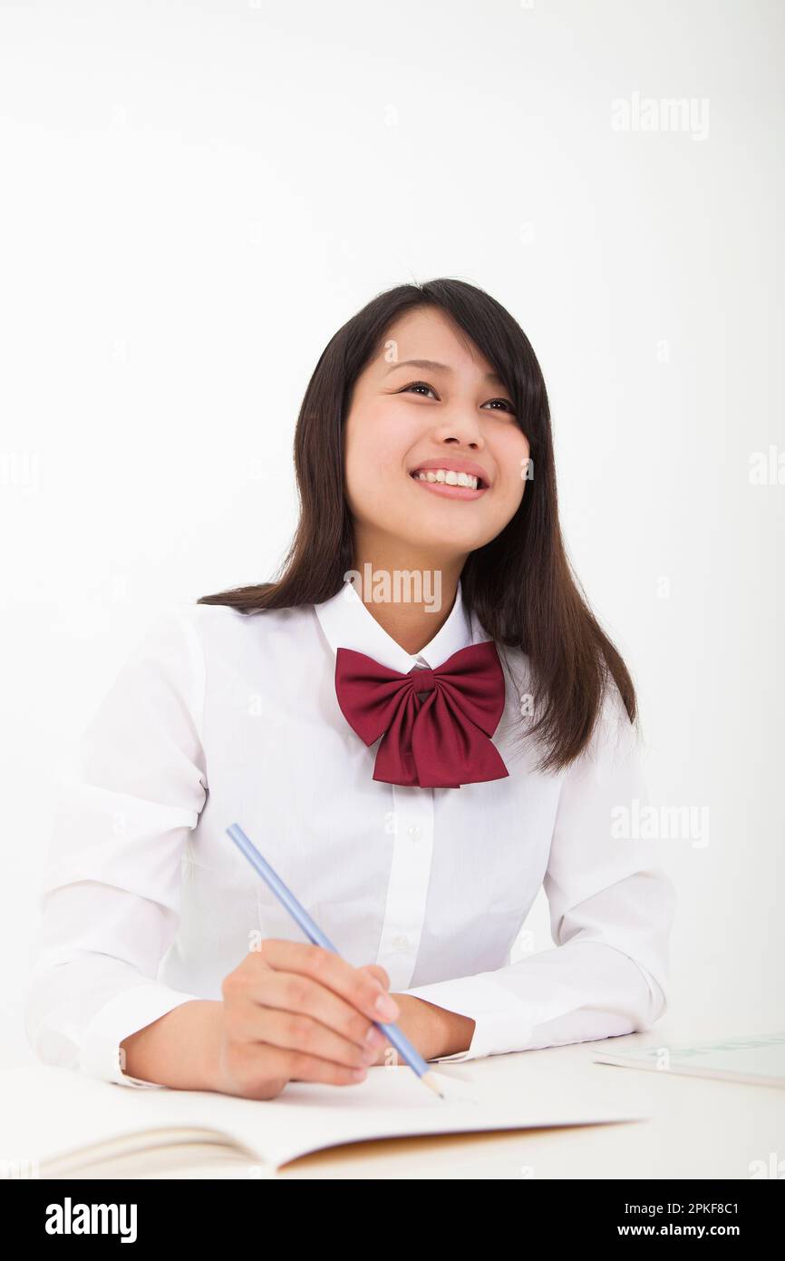 High school student taking notes Stock Photo - Alamy