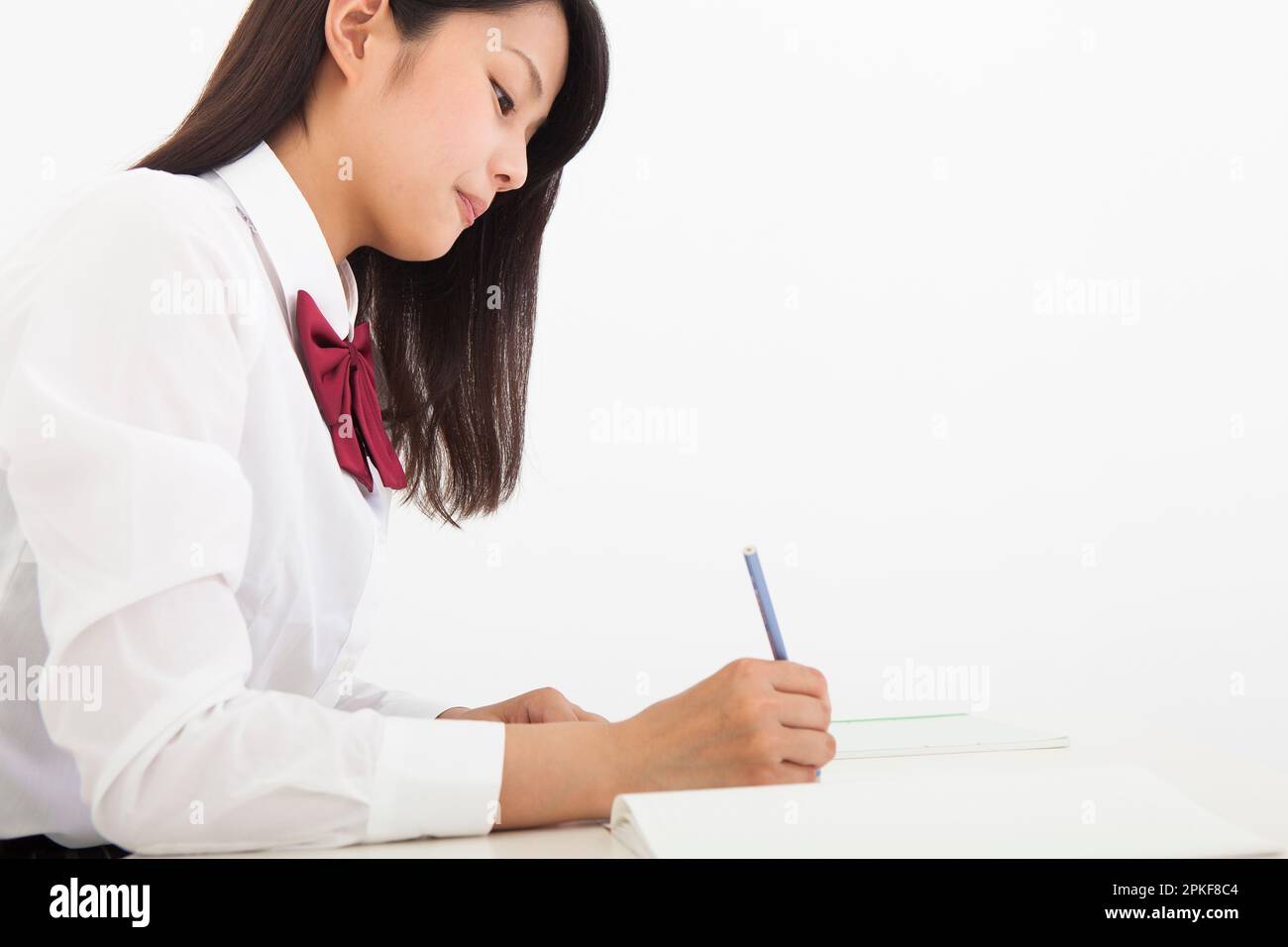 High school student taking notes Stock Photo - Alamy