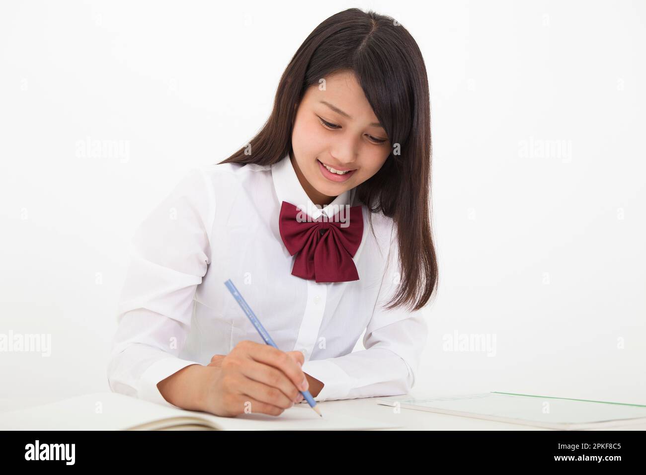 High school student taking notes Stock Photo - Alamy