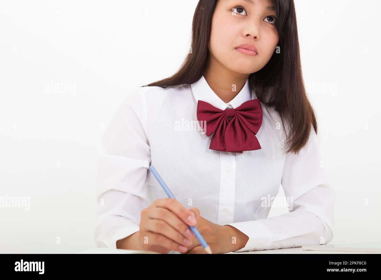 High school student taking notes Stock Photo - Alamy