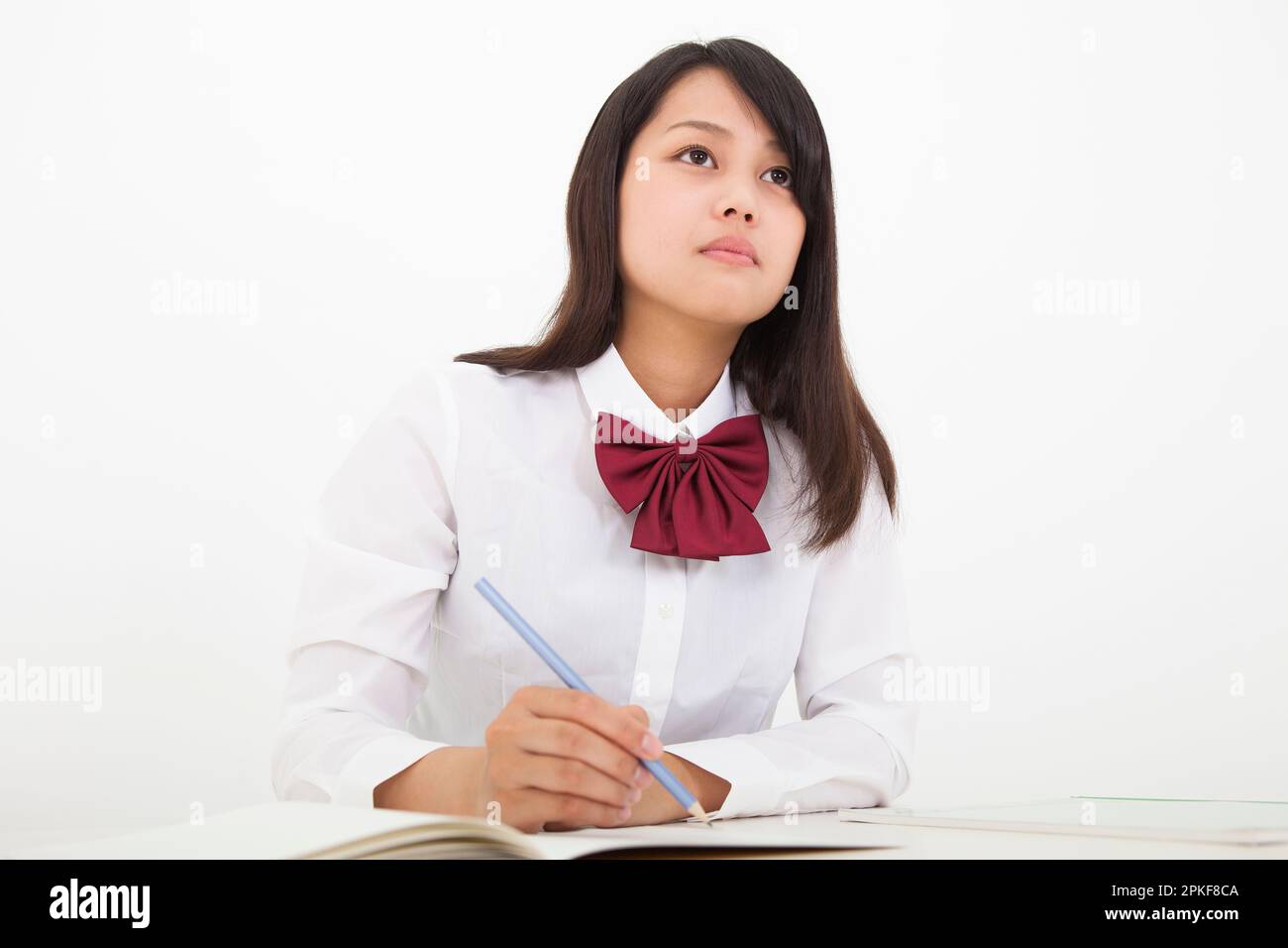High school student taking notes Stock Photo - Alamy