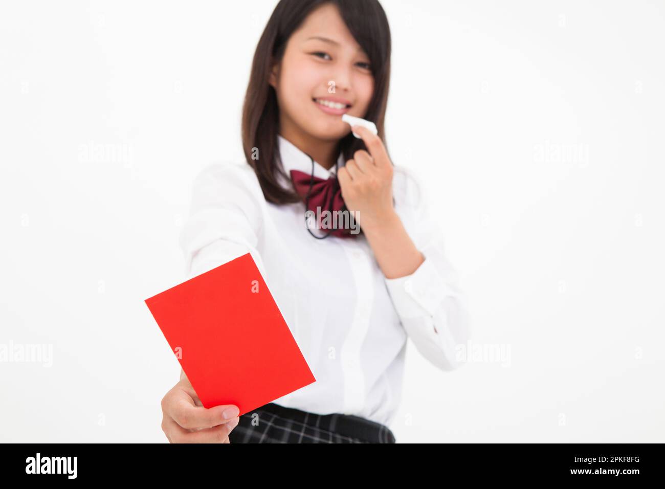 High school student who gives a red card Stock Photo - Alamy