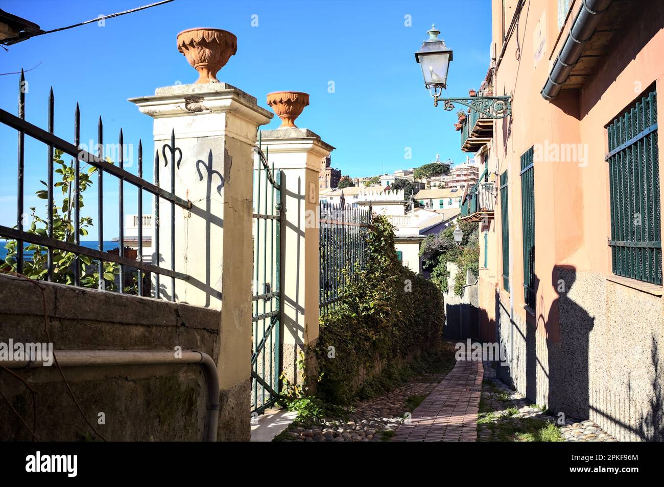Cobbled alley in a town on a hill on a sunny day by the seaside Stock ...