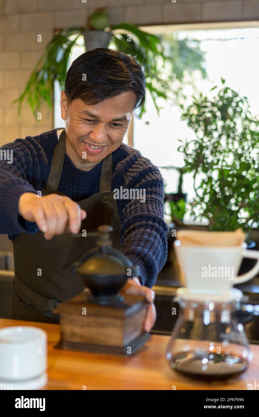 Middle aged man grinding hi-res stock photography and images - Alamy