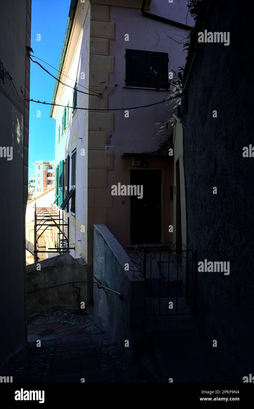Corner of a cobbled alley in the shade in a town by the seaside Stock ...