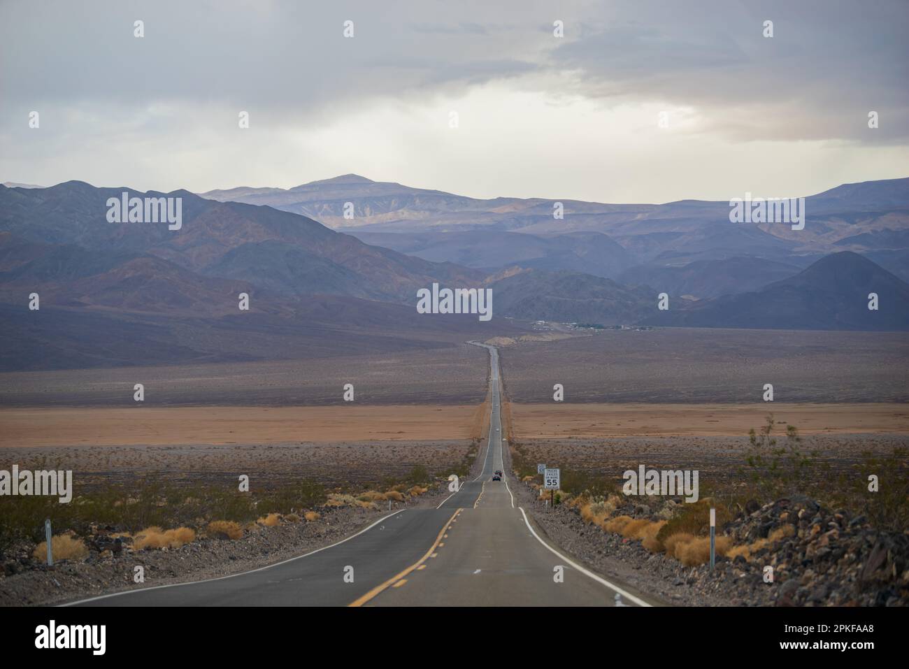 Beautiful straight road landscape around Death Valley National Park ...