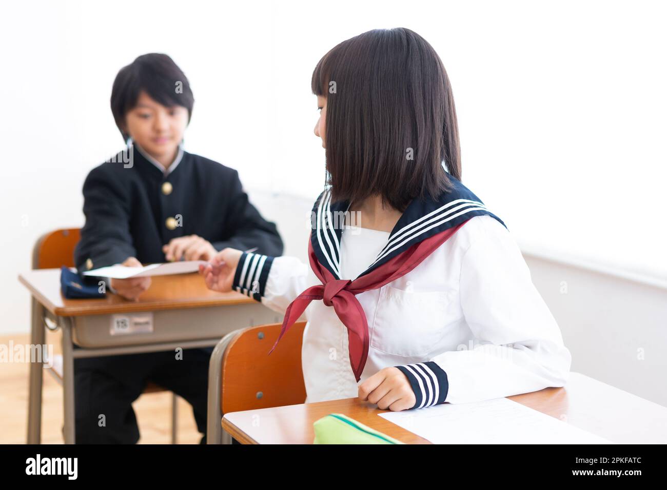Schoolgirl in class exam hi-res stock photography and images - Alamy