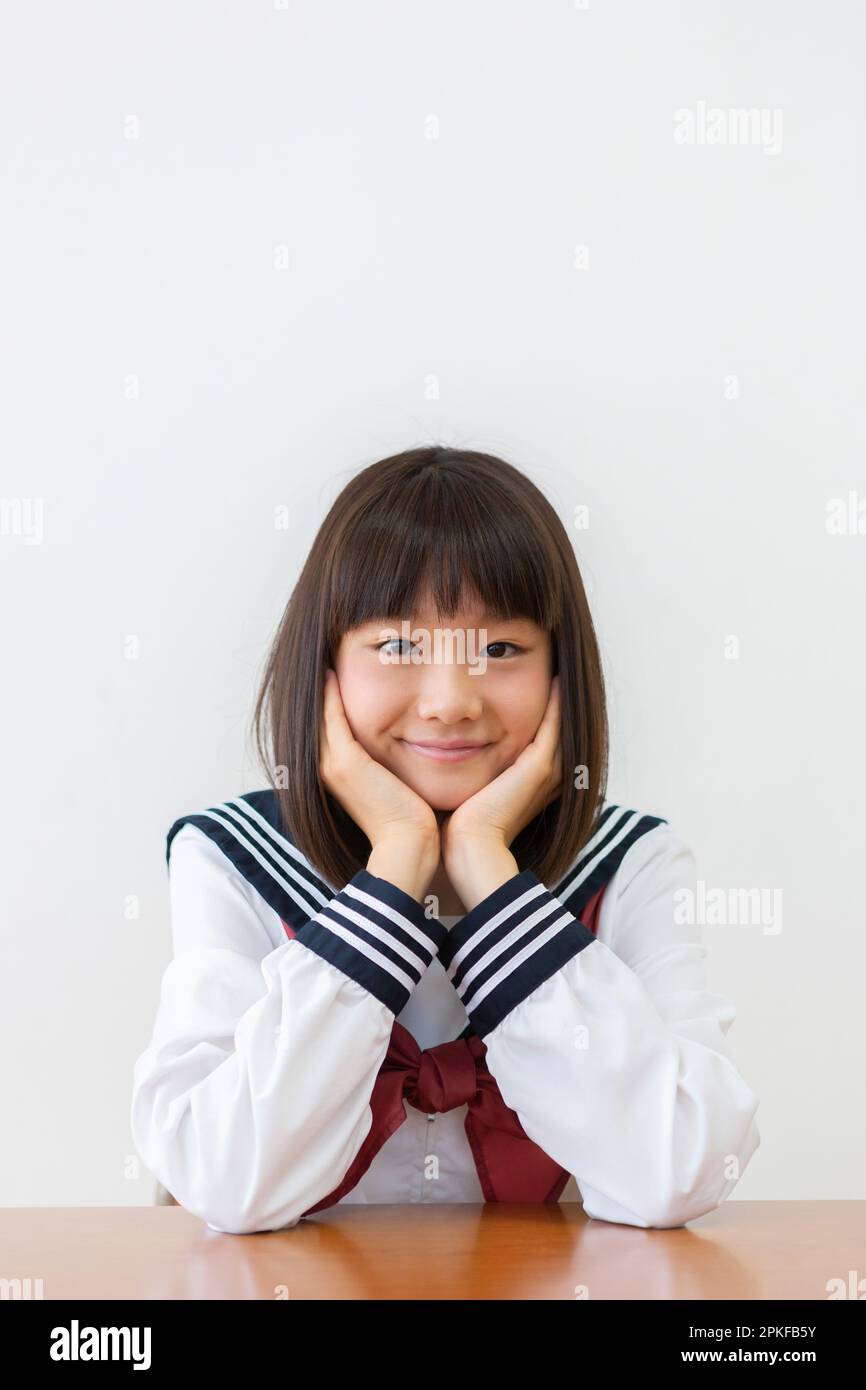 Junior High School Girl with Cheek Cane Stock Photo - Alamy