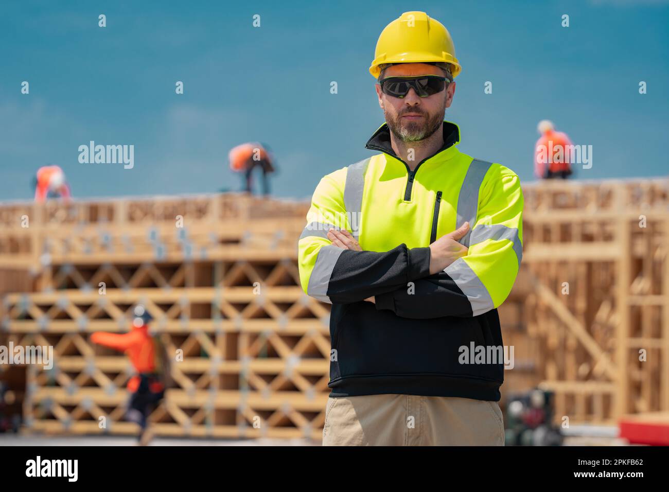 Construction builder in building uniform on buildings construction ...