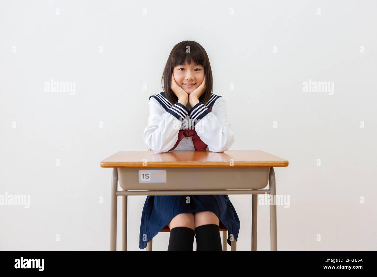 Junior High School Girl with Cheek Cane Stock Photo - Alamy