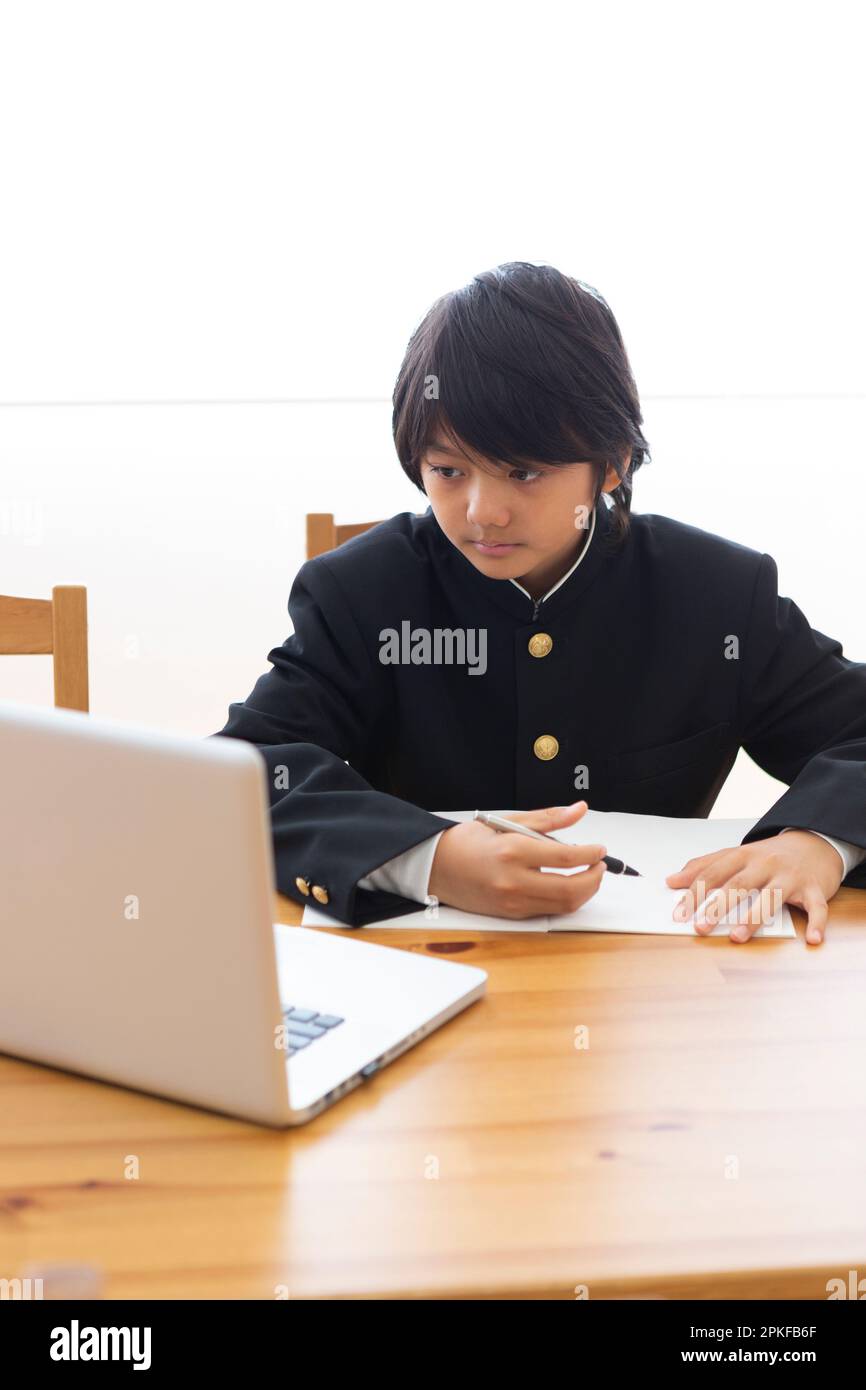 Junior high school students studying at home Stock Photo - Alamy
