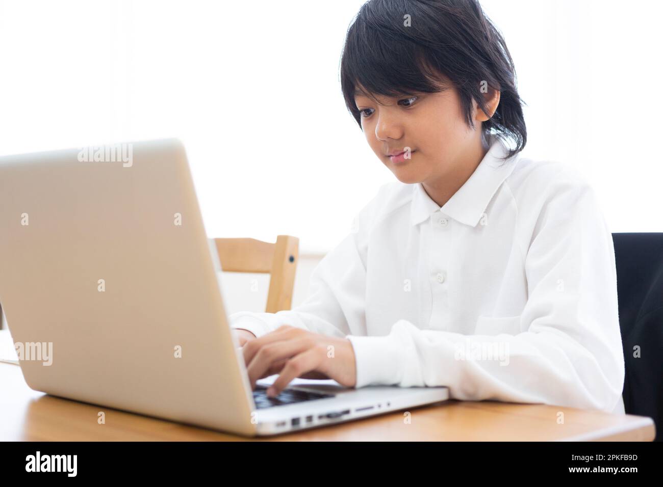 Junior high school students touching a PC Stock Photo - Alamy