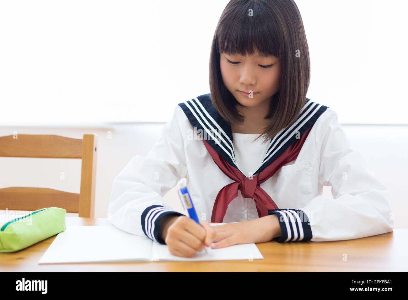 Junior high school students studying at home Stock Photo - Alamy