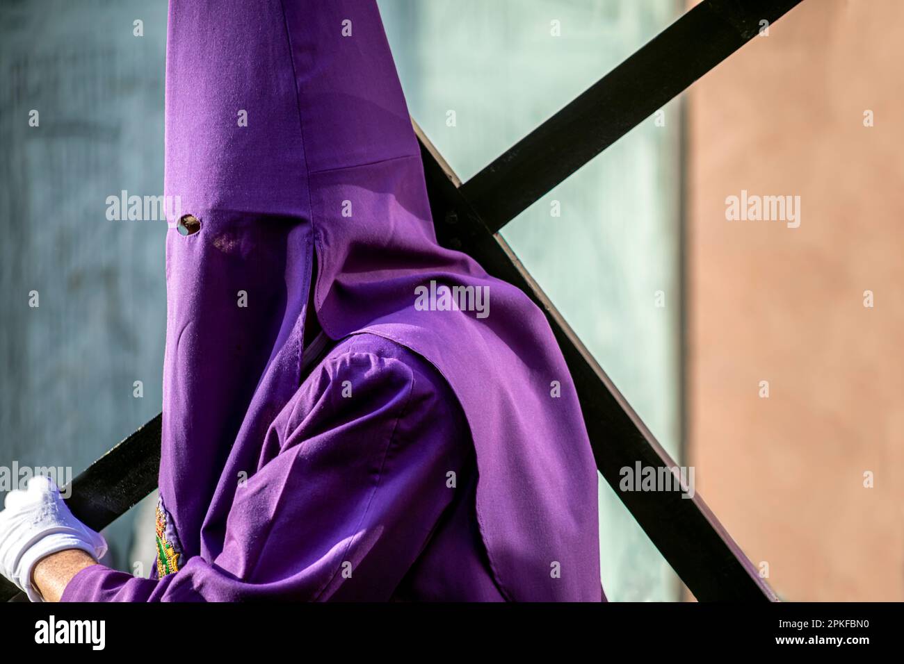 Nazareno with the cross and the hood in the Good Friday procession of ...