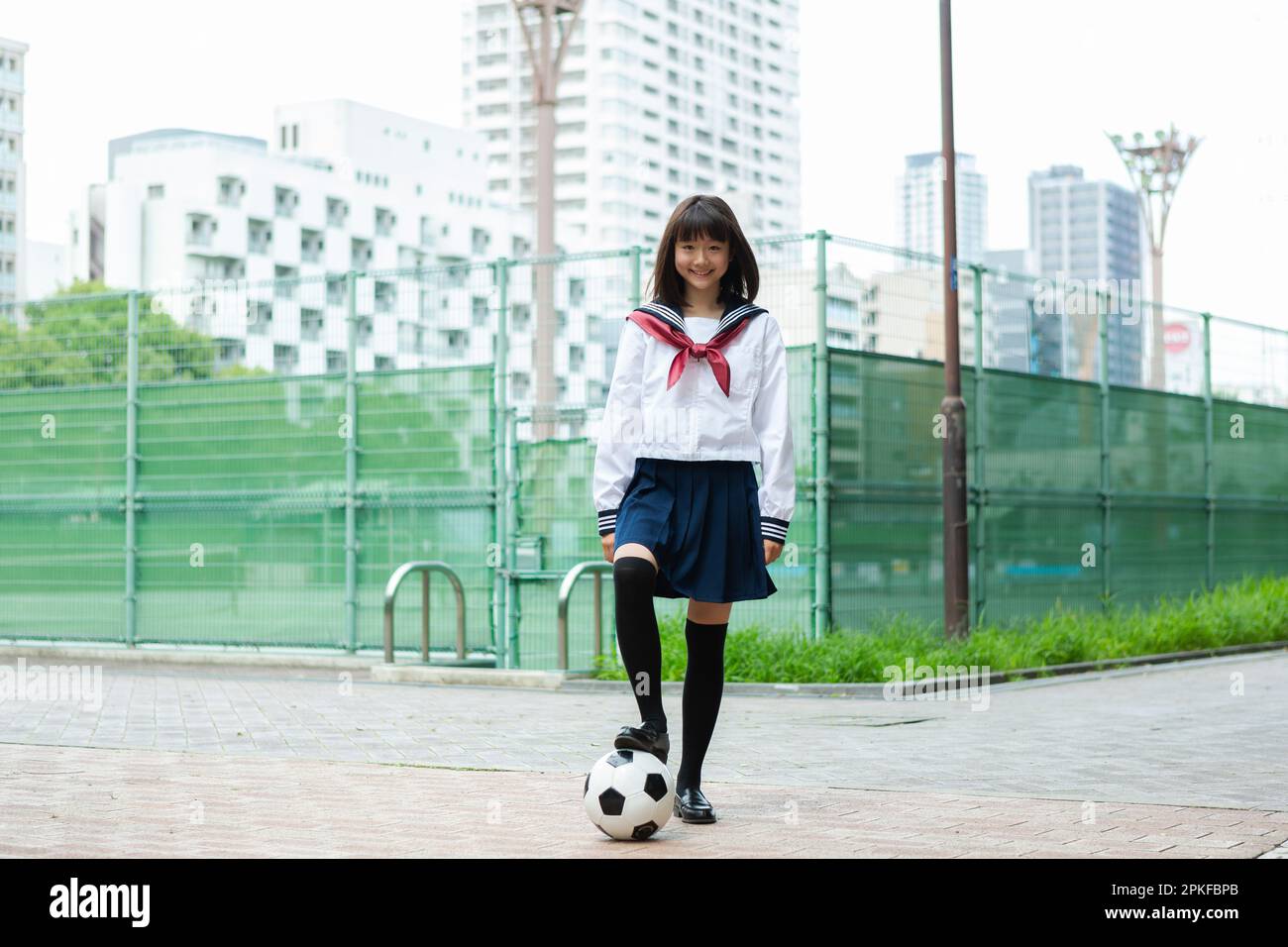Junior High School Students Treading on a Soccer Ball Stock Photo - Alamy