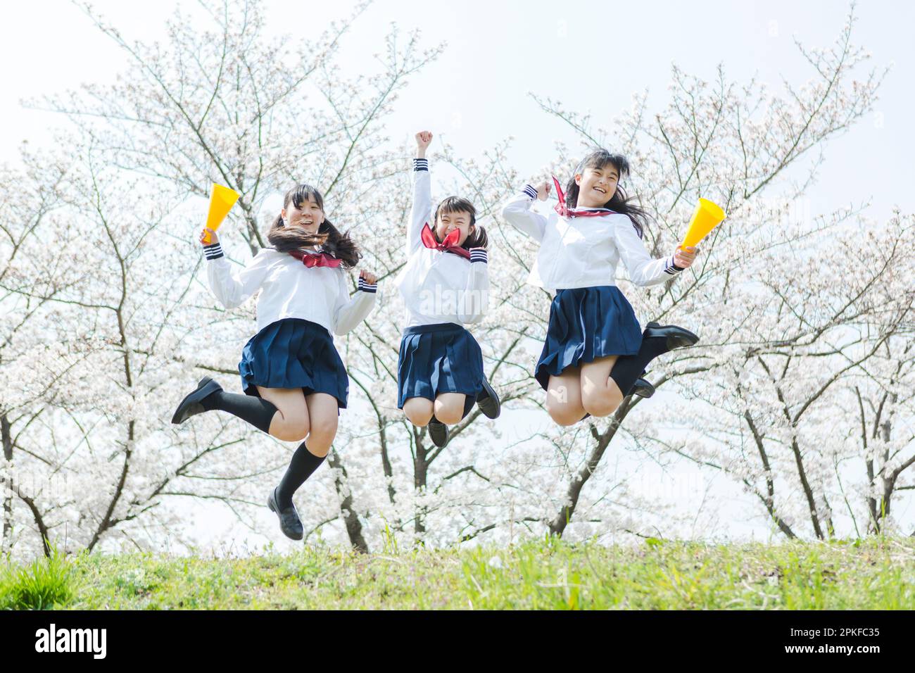 School girls cheering Stock Photo - Alamy